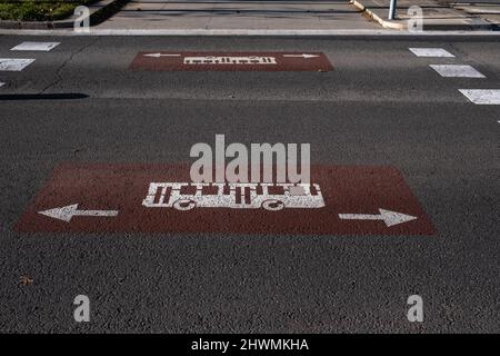 Asphalt road with arrow sign shows the direction of movement Stock ...