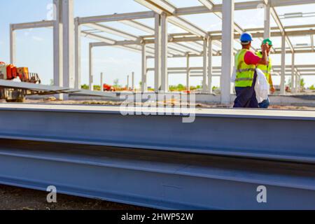 Prefabricated concrete skeleton frame building being constructed, building site. Shot with a ...