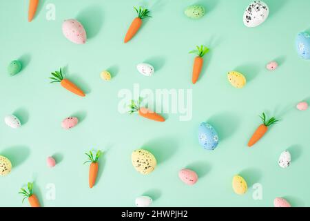 Spring carrots and painted easter eggs Stock Photo - Alamy