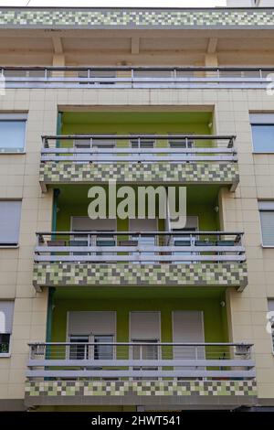 Green Terrace With Tiles at Modern Condo Building Stock Photo - Alamy