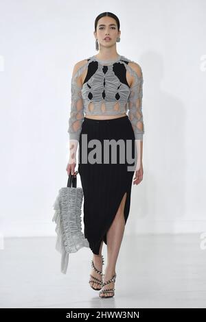 A model Marike Le Corre walks on the runway at the Ester Manas fashion ...