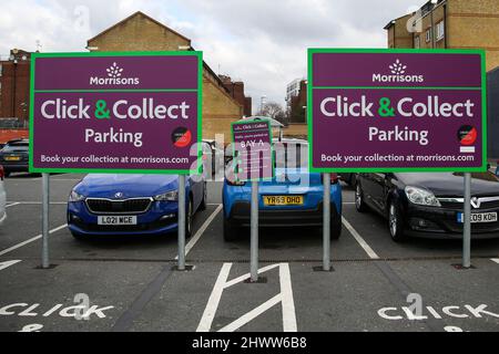 Morrisons supermarket's click and collect sign displayed in its car ...