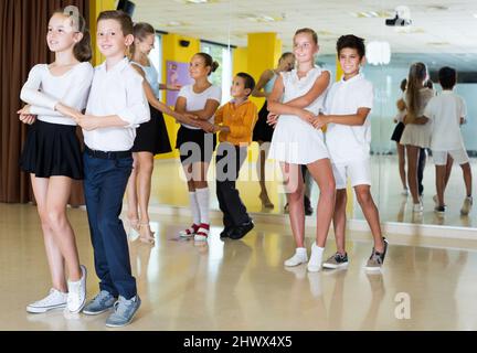 Children enjoying of partner dance Stock Photo - Alamy