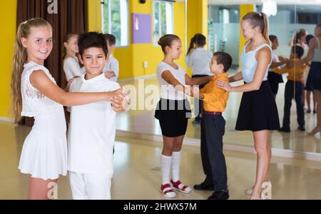 Children enjoying of partner dance Stock Photo - Alamy