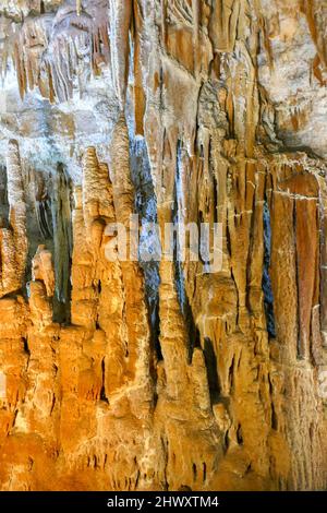 Detail of a flowstone in a limestone cave showing calcite deposits ...