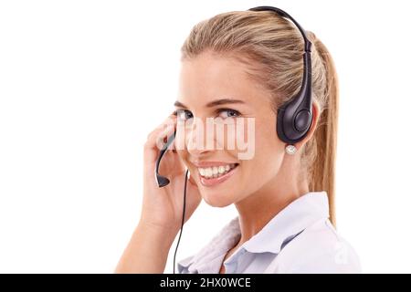 How may I help. A call centre operative speaking over her headset while ...