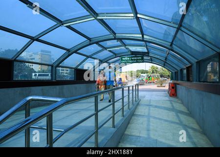 A couple seen walking through the subterranean pedestrian underpass in ...