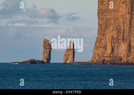 Risin og Kellingin rock formations on the coast of Eysturoy Island ...