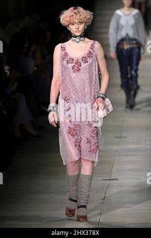 Model Pasha Harulia walks on the runway during the Prada Fashion Show ...