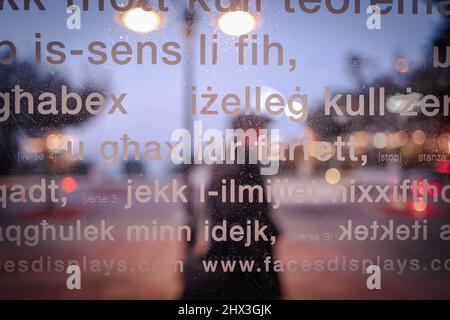Maltese text at the bus stop Stock Photo - Alamy