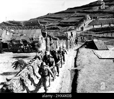 Chinese Nationalist troops march through the outskirts of Nanking ...