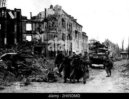 Allies in Bombed City of Cologne: American troops clearing the streets ...