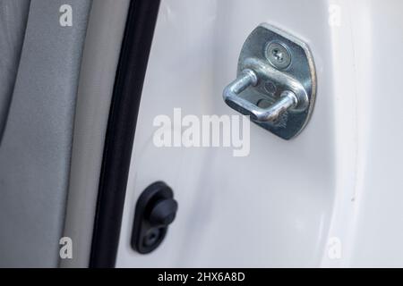 Car door striker plate hook Stock Photo Alamy