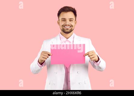 Businessman holding a message icon, bubble talk notification sign in ...