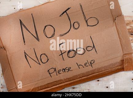 cardboard sign from someone begging for food Stock Photo - Alamy