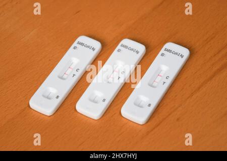 Three positive COVID-19 antigen, lateral flow, self tests. White tests ...