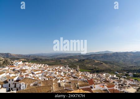 The rooftops and whitewashed houses of the old city center of Olvera ...
