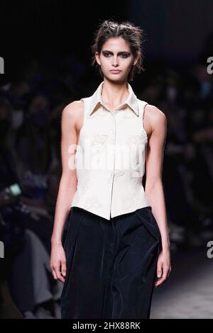 A model walks the runway at the Ynes Suelves fashion show during ...