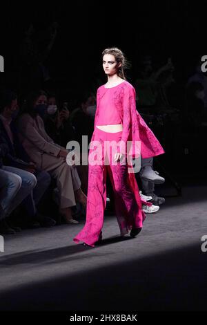 A model walks the runway at the Ynes Suelves fashion show during ...