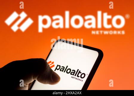 In this photo illustration, a Palo Alto Networks logo is seen displayed ...