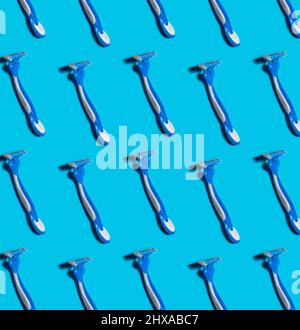 Disposable razors on blue background, studio shot Stock Photo - Alamy