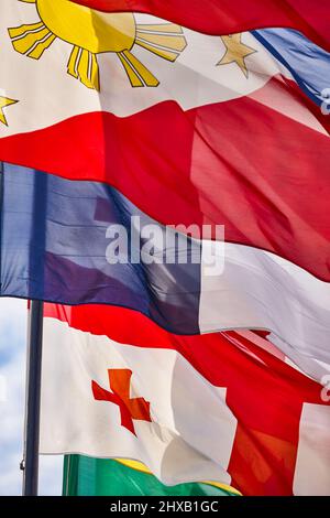 Flags of the word waving in the wind. Nation emblems Stock Photo - Alamy