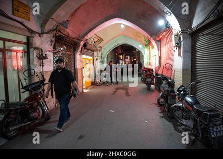 Qom, Iran. 10th Mar, 2022. A group of Pakistani visitors is sitting at ...