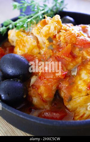 White fish fillet Provencal style Stock Photo - Alamy