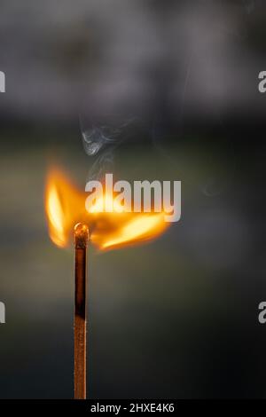 Single Match Stick flame with room for copy Stock Photo - Alamy