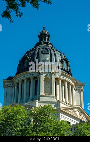 The South Portico of the White House is framed by trees on the Ellipse ...