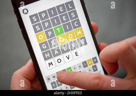 Berlin, Germany. 11th Mar, 2022. A person plays with the app of an ...