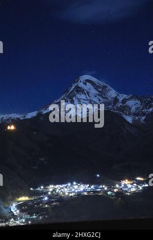 Beautiful night view Qazbegi Mountain valley Stock Photo - Alamy