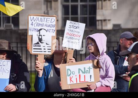 Downing Street, London | UK - 2022.03.12: Girls with Ukrainian flags ...