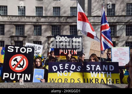 Downing Street, London | UK - 2022.03.12: Girls with Ukrainian flags ...