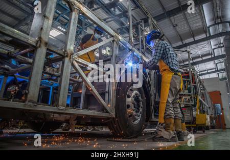 Hyderabad, India's Telangana state. 12th Mar, 2022. Workers of Megha ...