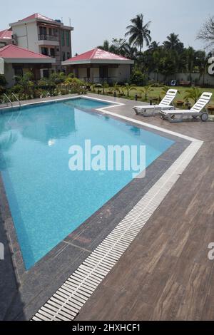 Swimming pool of Nodi Teerae. The river side resort by the river Ganges ...