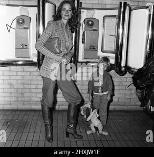 Charlotte Rampling at Heathrow Airport with her son Barnaby and husband ...