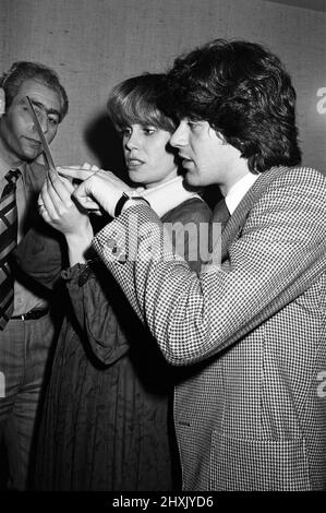 Actress Joanna Lumley judging a Purdey haircut lookalike contest with ...