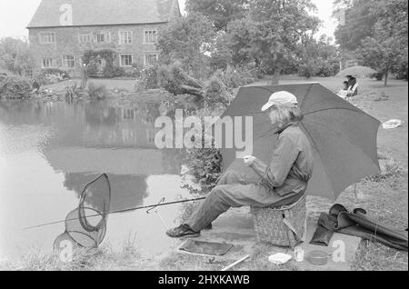 Anglers gathered at Wilfred's Pond near Hose in the Vale of Belvoir ...