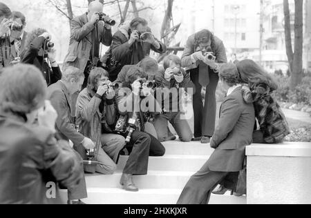 Roger Moore with Barbara Parkins who star in the film Shout at the ...