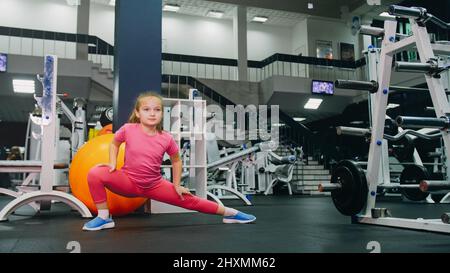 Fit Athletic Baby Girl Work out with Dumbbell, Doing Her Fitness ...