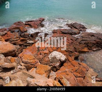 Beach rock can be broken into slabs and reworked during storms,forming ...