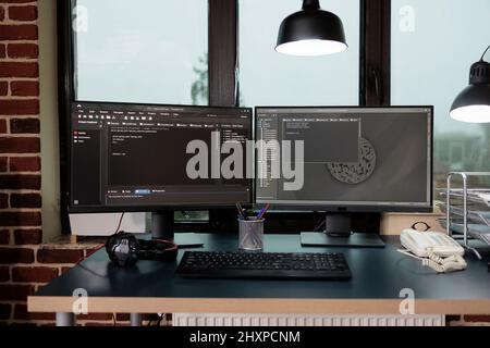 Empty office with multiple monitors showing hacking attack alert, IT ...