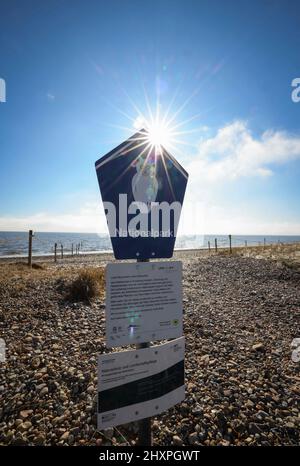 Witsum, Germany. 04th Mar, 2022. A "National Park" sign stands on the ...