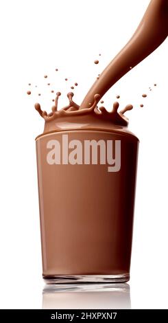 Chocolate milk pouring into a glass, splashing as it flows over ...