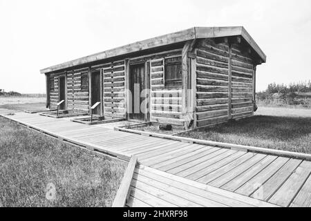 A reconstructed buildings of wood and chink of a trading post from ...