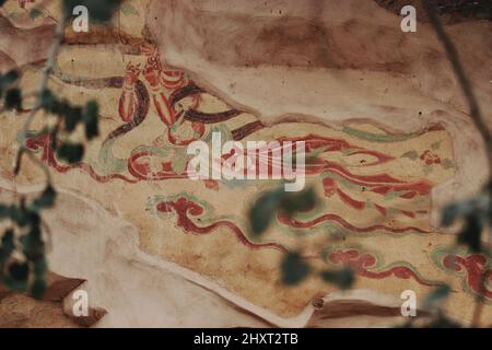 Closeup shot of cave paintings and petroglyphs in the Sahara desert ...