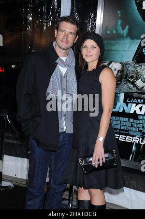 Scott Foley and wife Marika attending the premiere of "Unknown" held at ...
