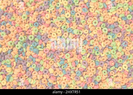 Sweet multicolored flakes, cereal loops as a background Stock Photo - Alamy