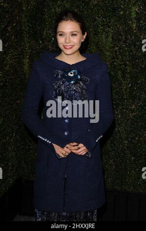 Elizabeth Olsen attending the Chanel Pre-Oscar Dinner held at Madeo ...